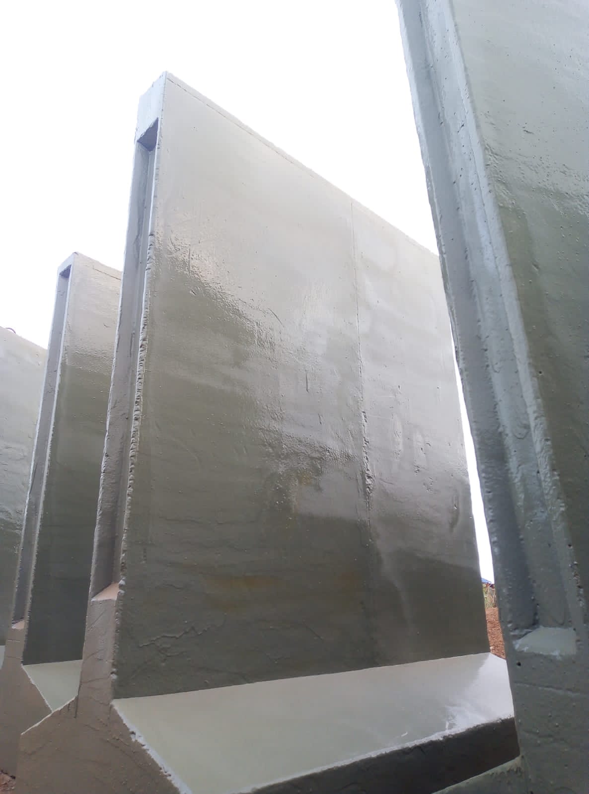 MILITARY BASE CONCRETE 'T' WALL BARRIER - DELTA Coatings
